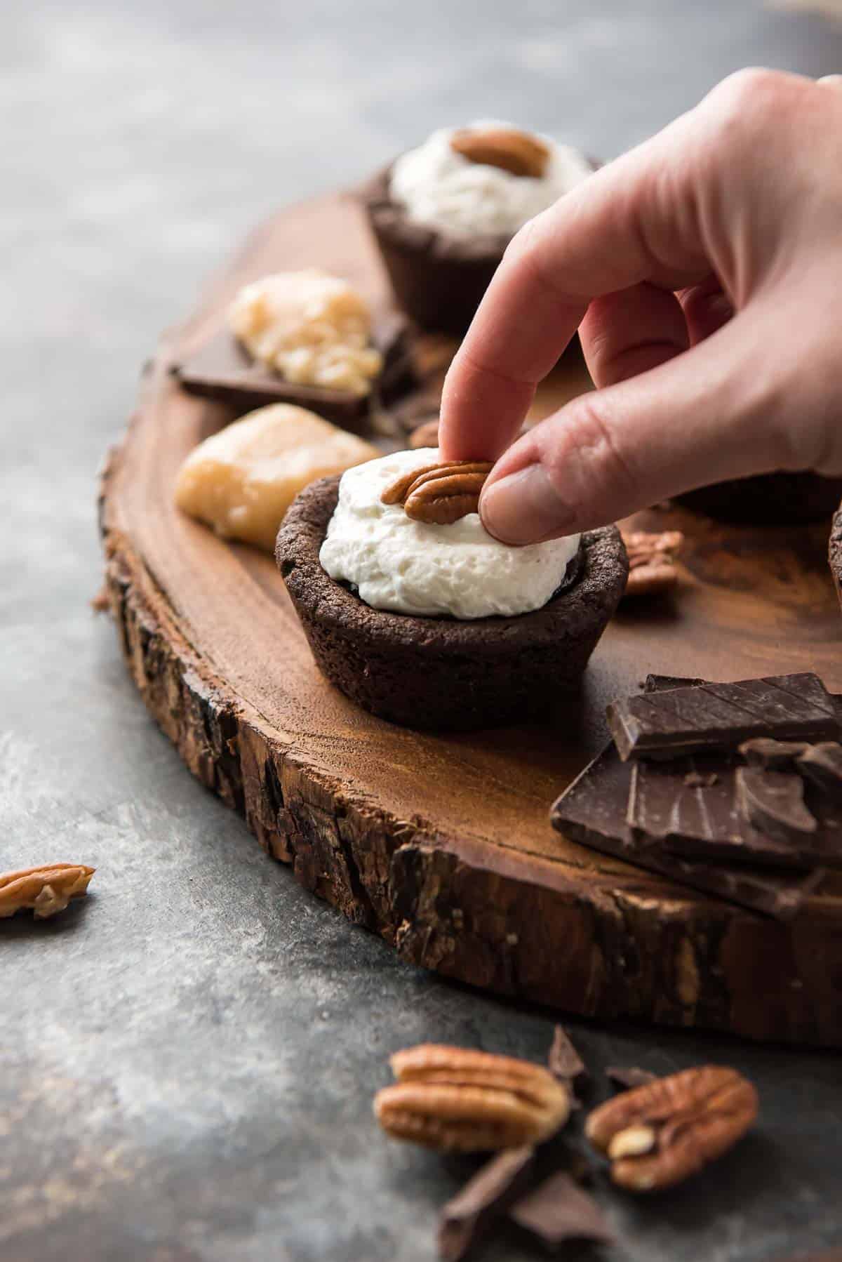 Gooey Triple-Layer Chocolate Turtle Pie Cookie Cups • The Crumby Kitchen