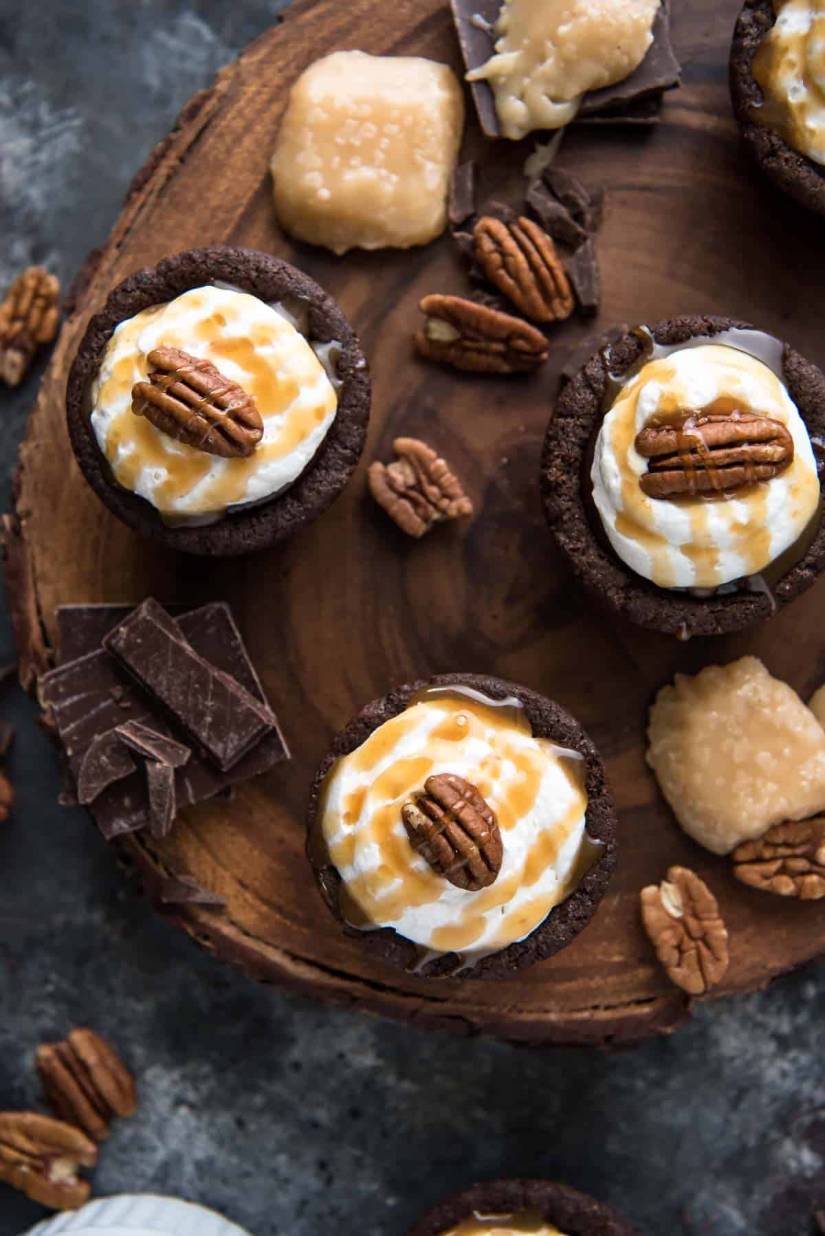 Gooey Triple-Layer Chocolate Turtle Pie Cookie Cups • The Crumby Kitchen