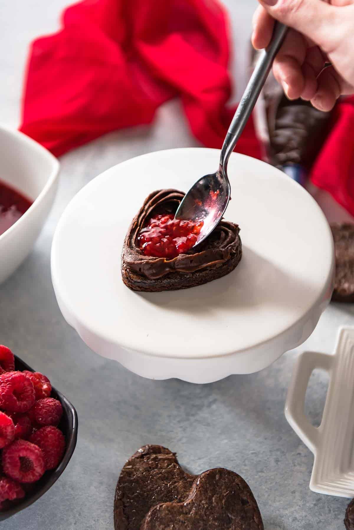 Mini Brownie Cakes with Raspberry Coulis • The Crumby Kitchen