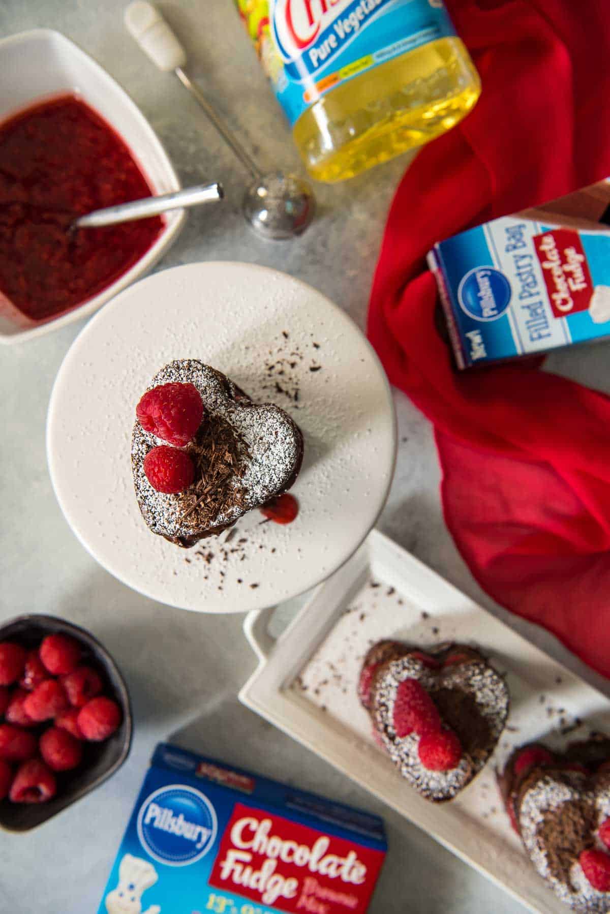 Mini Brownie Cakes with Raspberry Coulis • The Crumby Kitchen